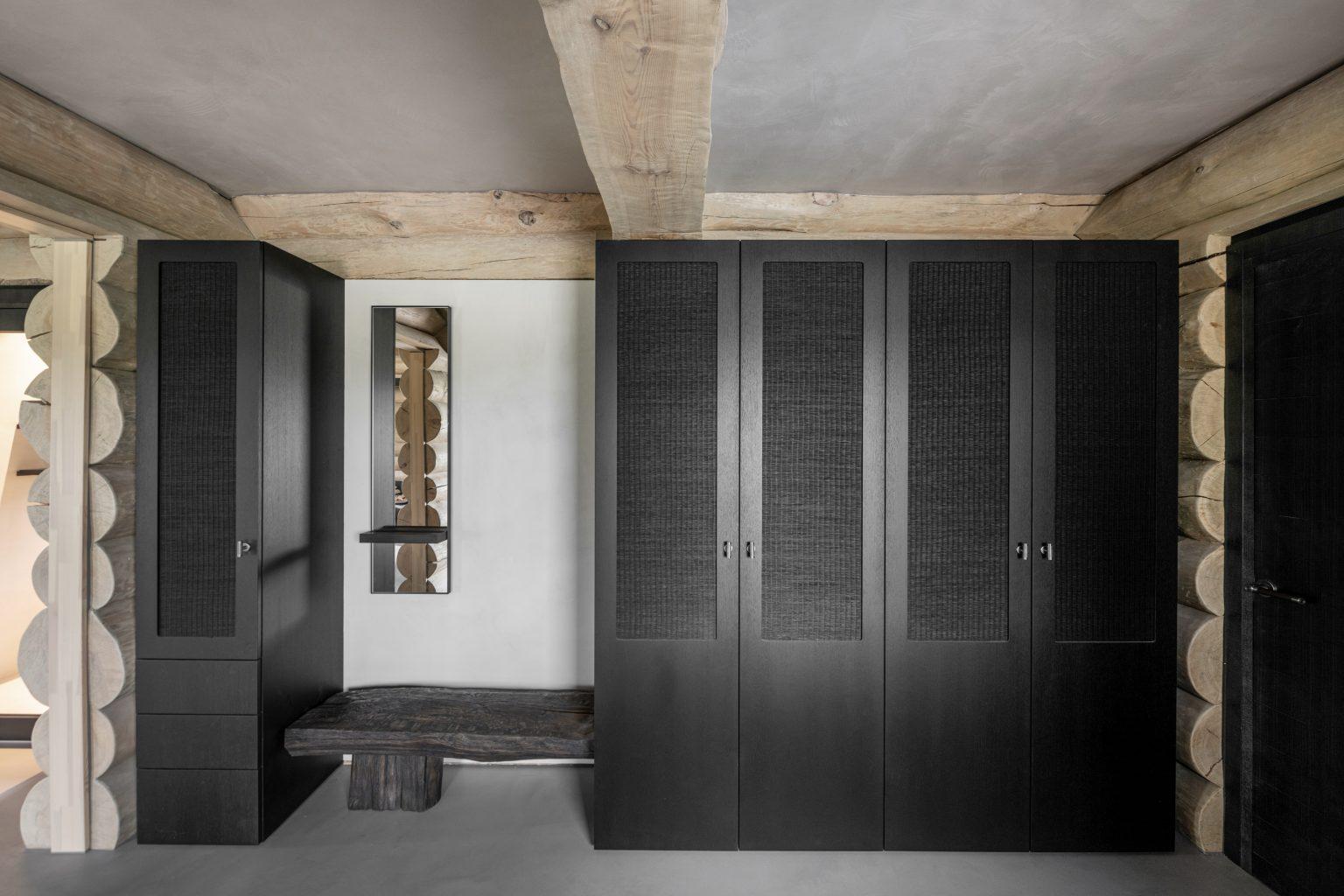 Turnstyle Designs Crafting harmony in unique log house interior ...